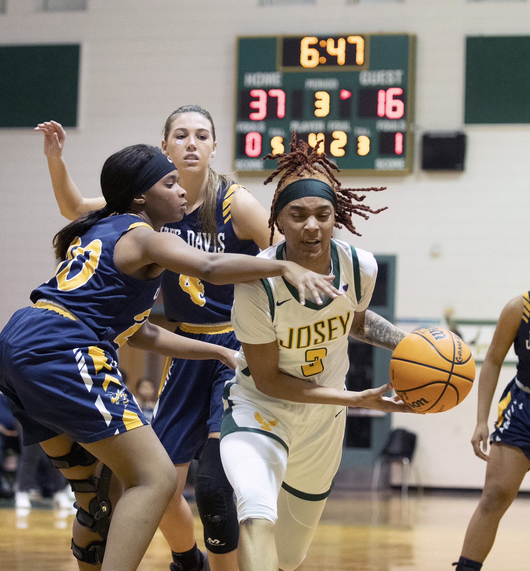 Photojournalism: Josey girls take on Jeff Davis in the high school ...