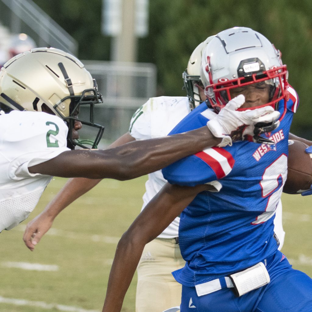 Photojournalism: Aquinas rolls over Westside - The Augusta Press